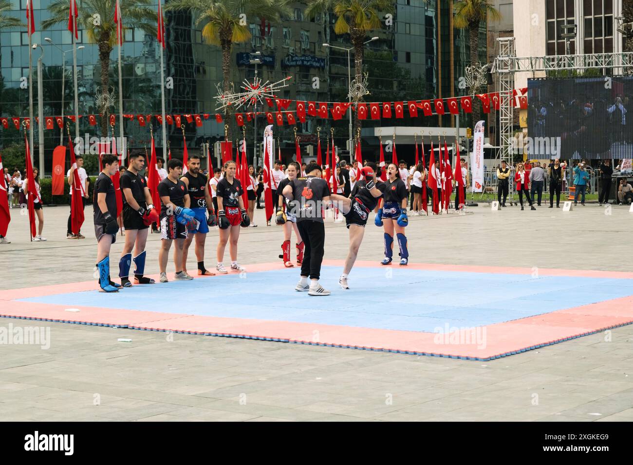 Izmir, Turkey - May 19 2024: Kickboxing students perform on the tatami ...