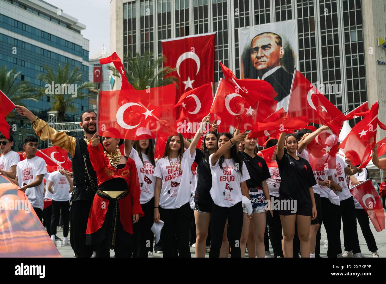 Izmir, Turkey - May 19 2024: Young athletes marching with Turkish flags ...