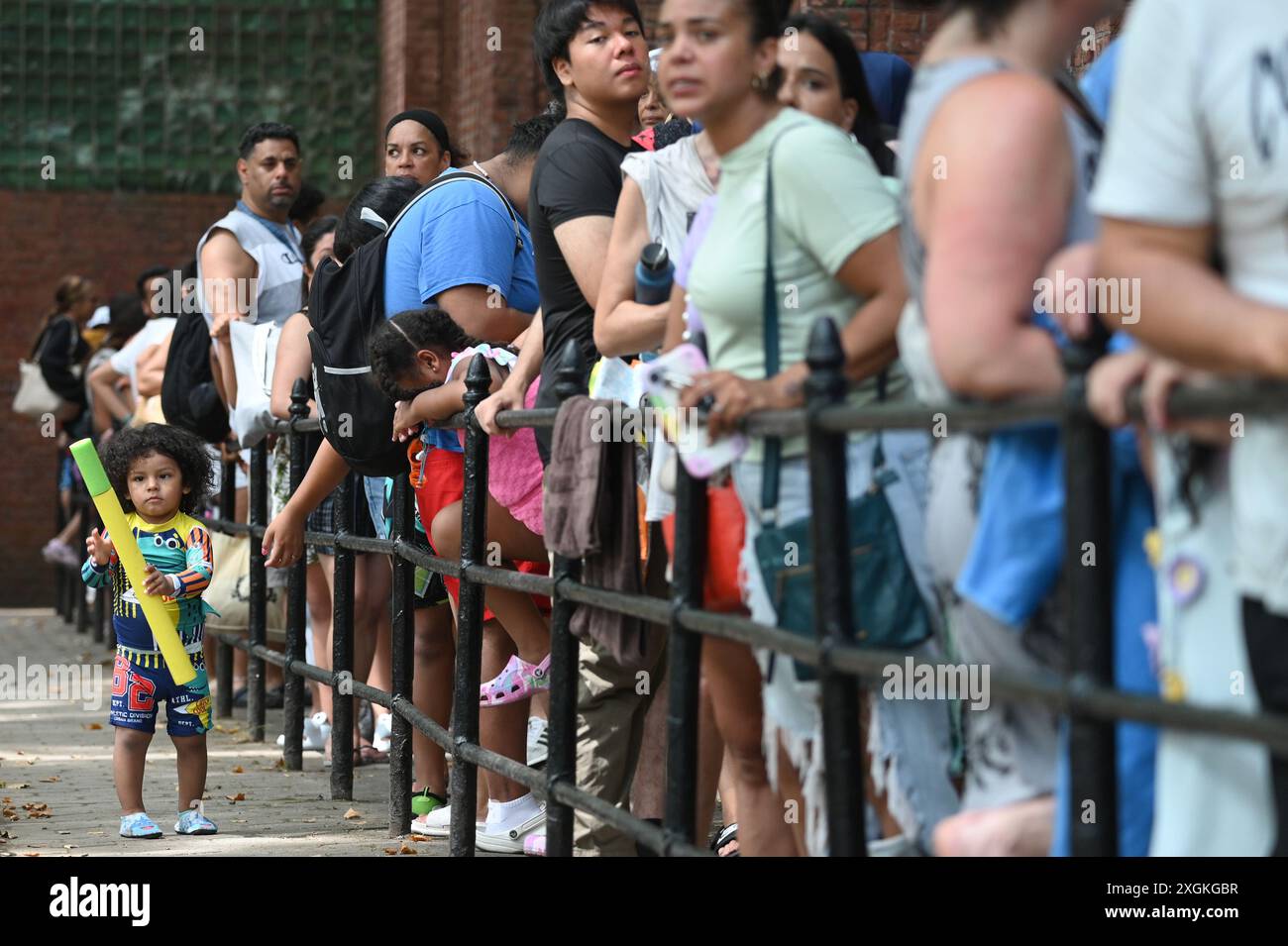 New York, USA. 09th July, 2024. People stand in line for access to the ...
