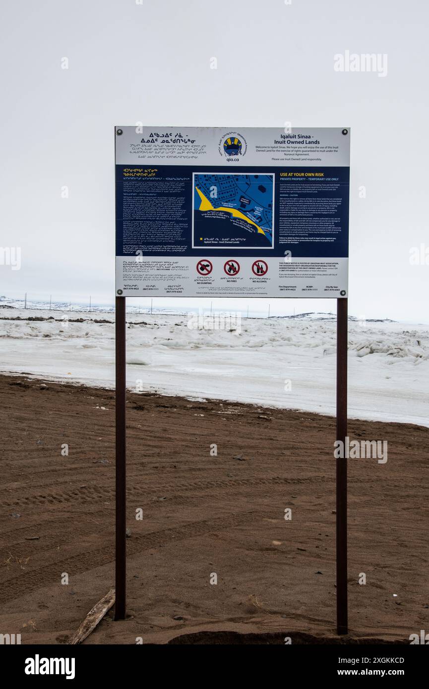 Bilingual Iqaluit Sinaa Inuit owned lands sign in English and Inuktitut ...
