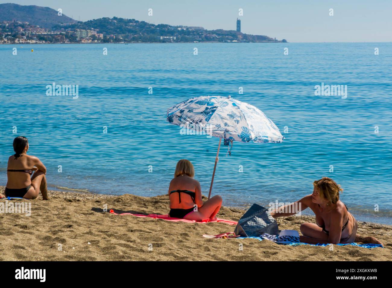 Bathers sunbathing on beach playa hi-res stock photography and images ...