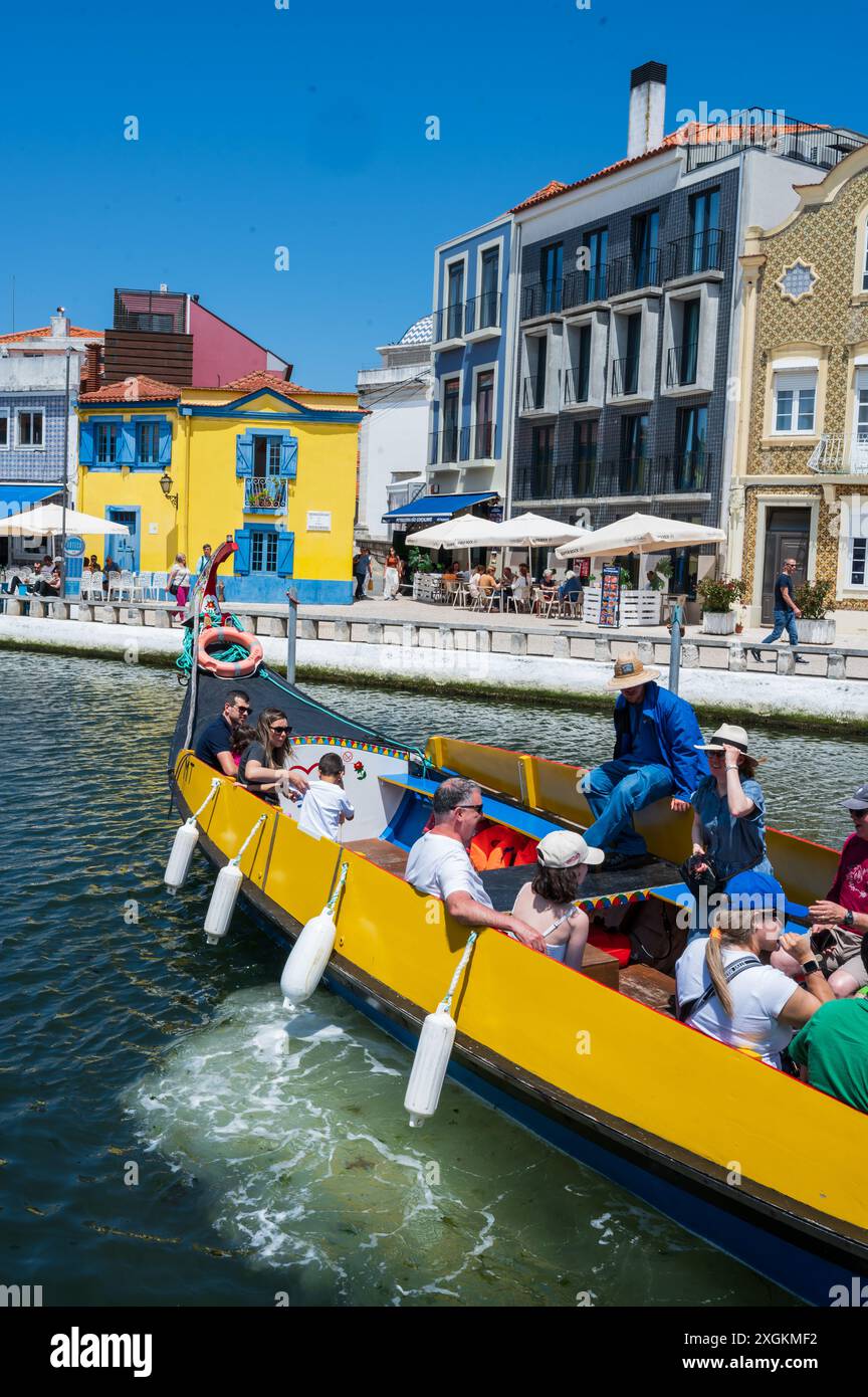 Boat ride through canals in a colorful and traditional Moliceiro boat ...