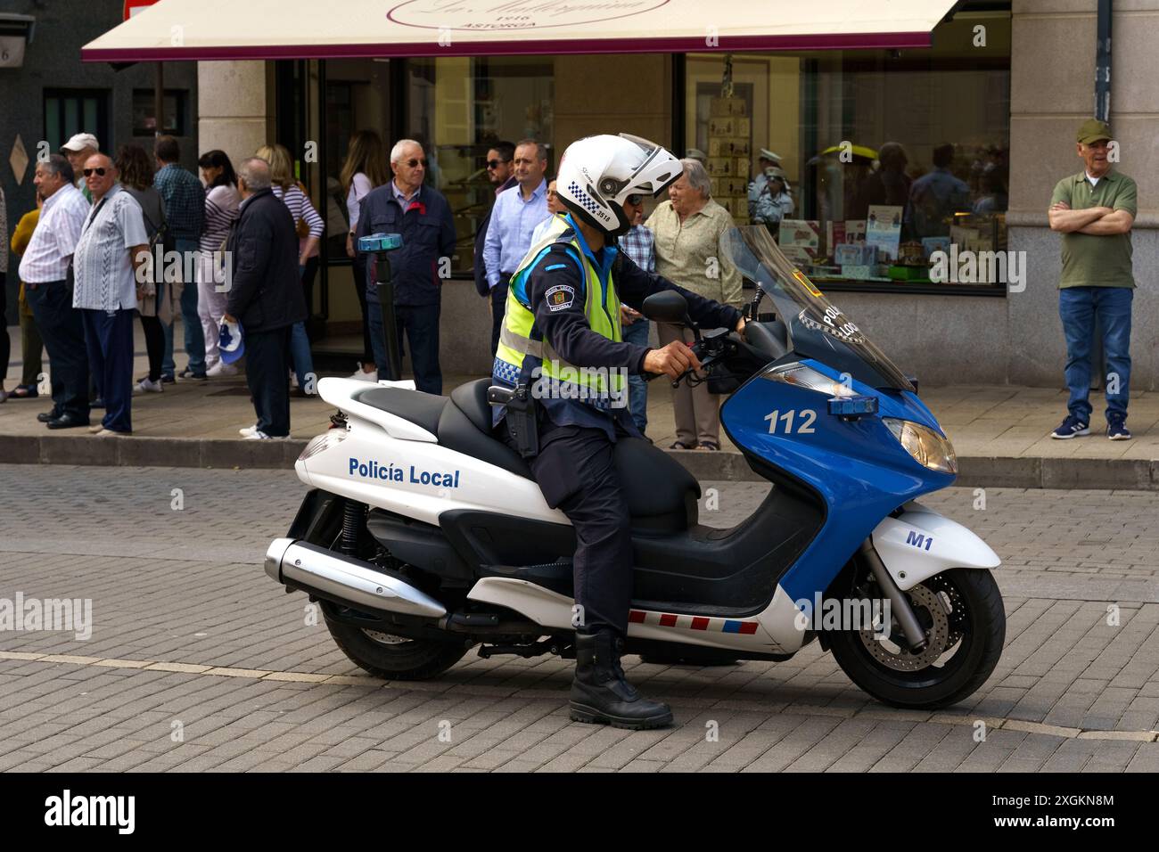 Astorga, Spain - June 4, 2023: A police officer in uniform riding a ...