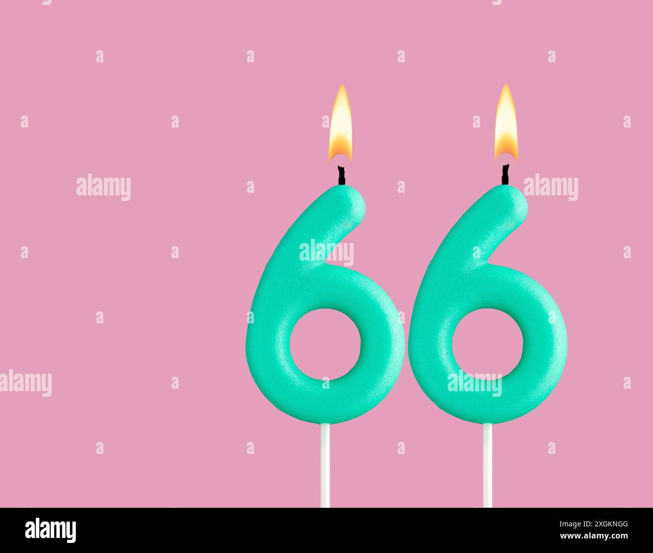 Green candle number 66 - Birthday card on pastel pink background Stock ...