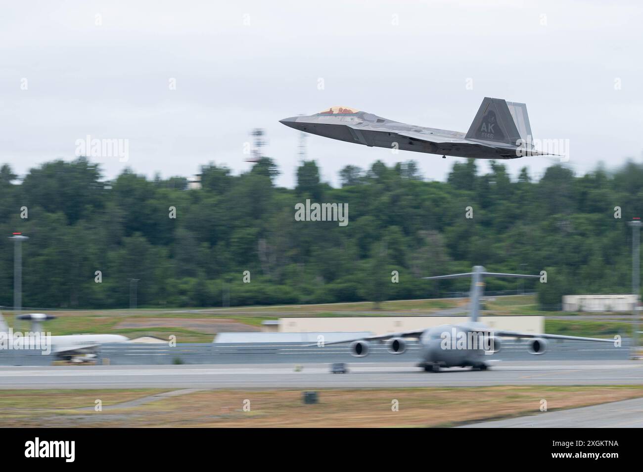 An U.S. Air Force F-22 Raptor takes off during exercise Arctic Defender ...