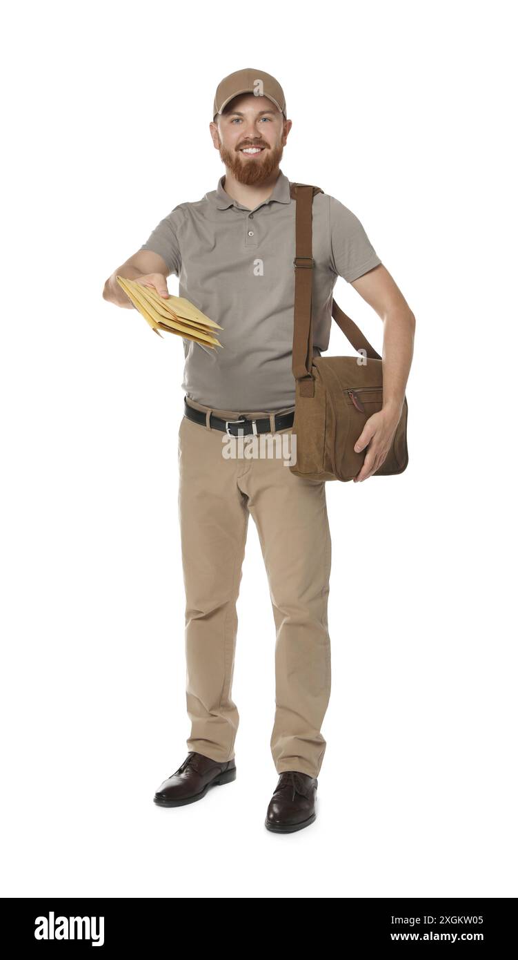 Happy young postman with brown bag delivering letters on white ...