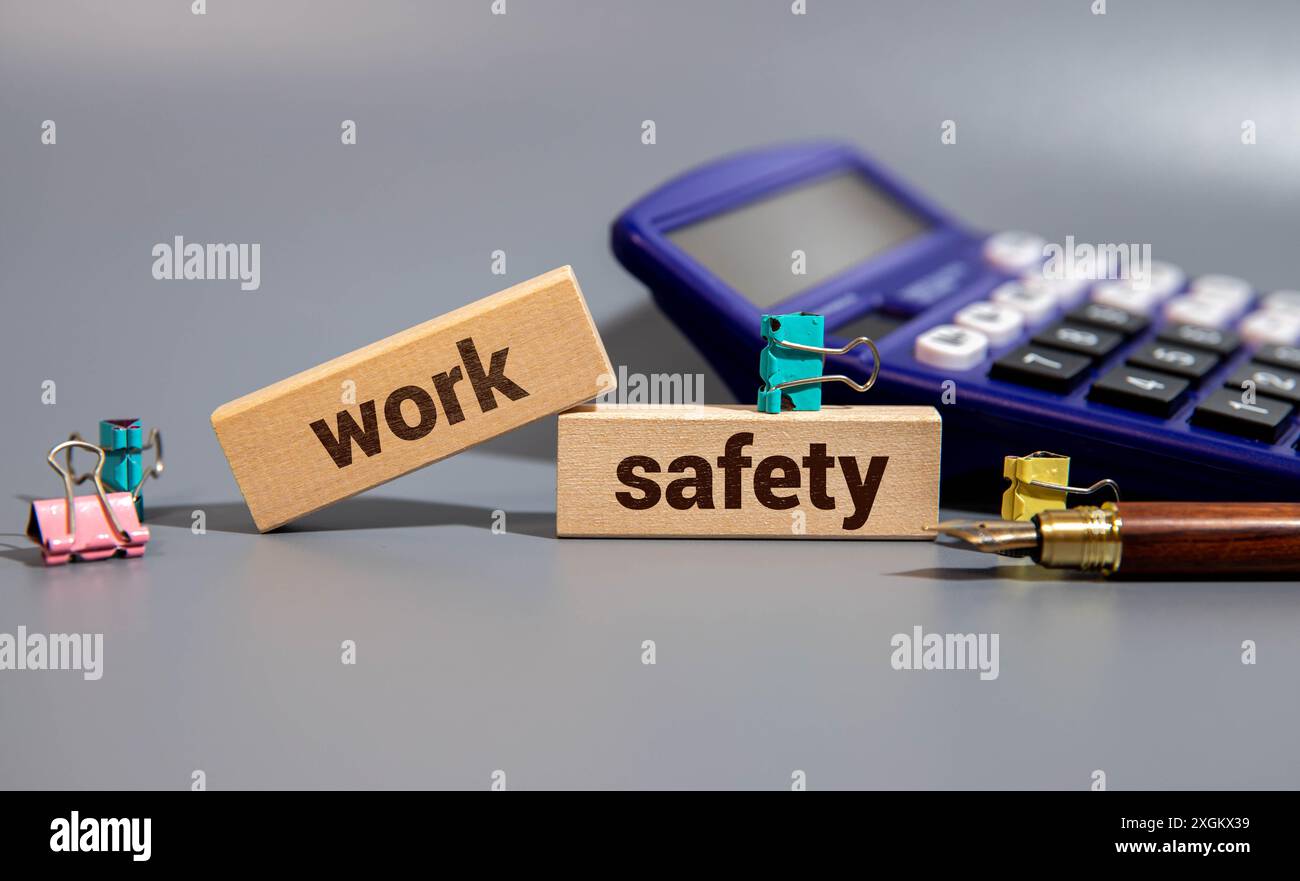 work safety word written on wood block. work safety text on table ...