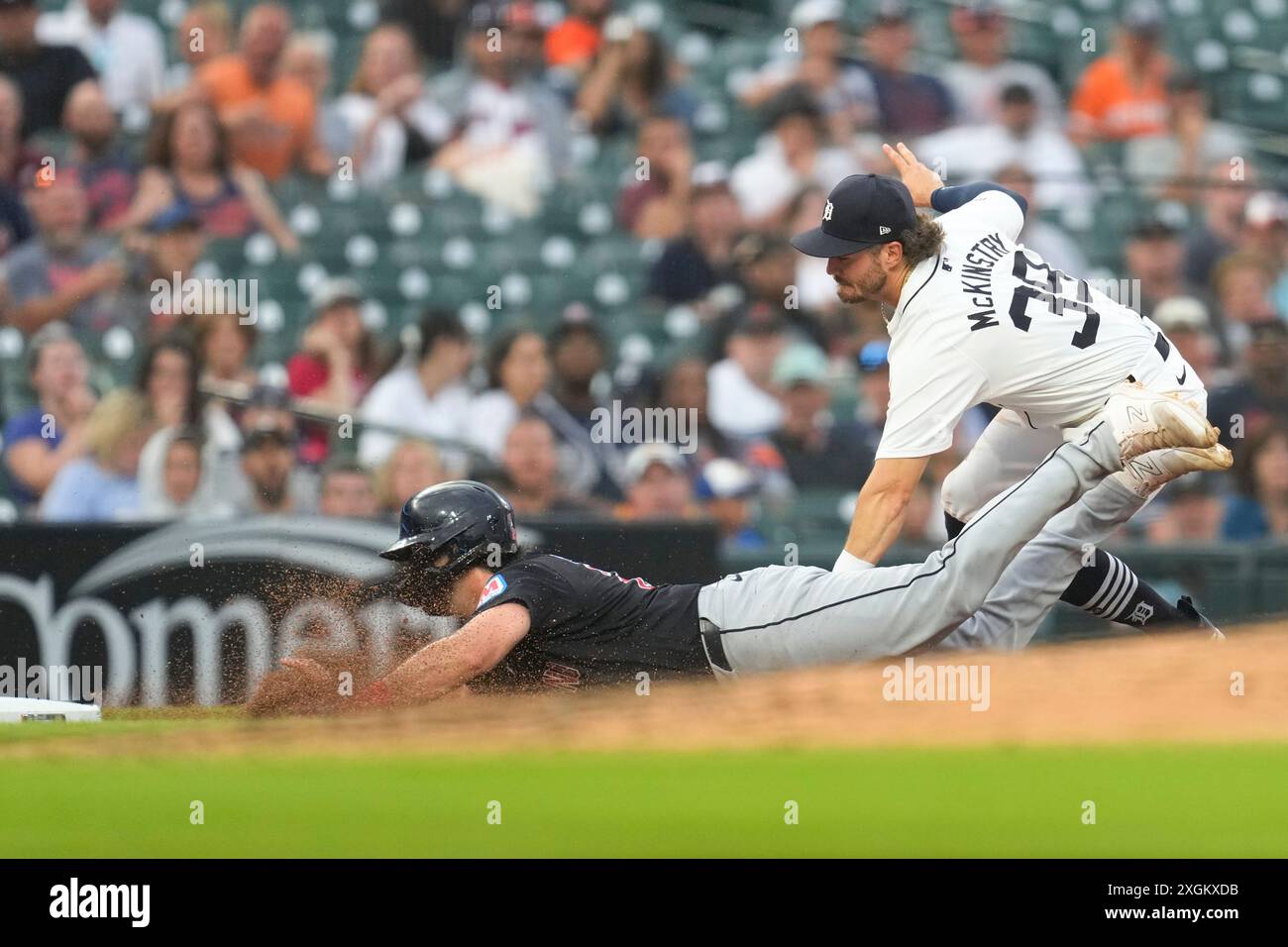 Cleveland Guardians' Austin Hedges slides safely into third base under ...