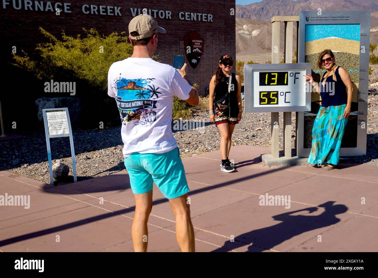 Matt Fiedler takes a photo of daughter Sally Fiedler, left, and wife ...