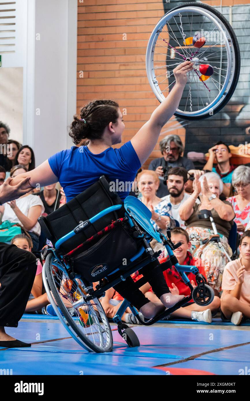 Circus performers putting on a show for children during the Fiestas del ...