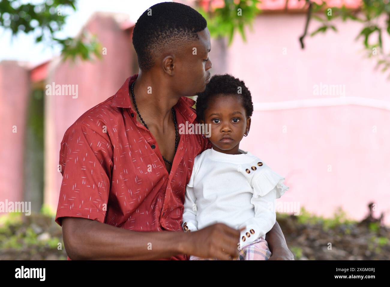 Portrait of a beautiful baby small girl with her father Stock Photo - Alamy