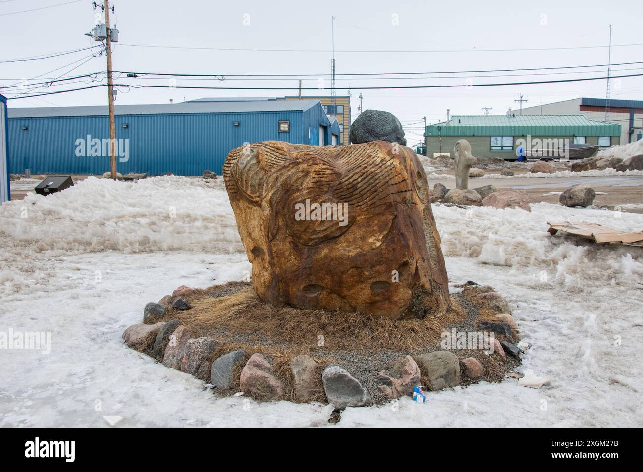 Stone carving of fish swimming at Inuit sculpture park by the Four ...