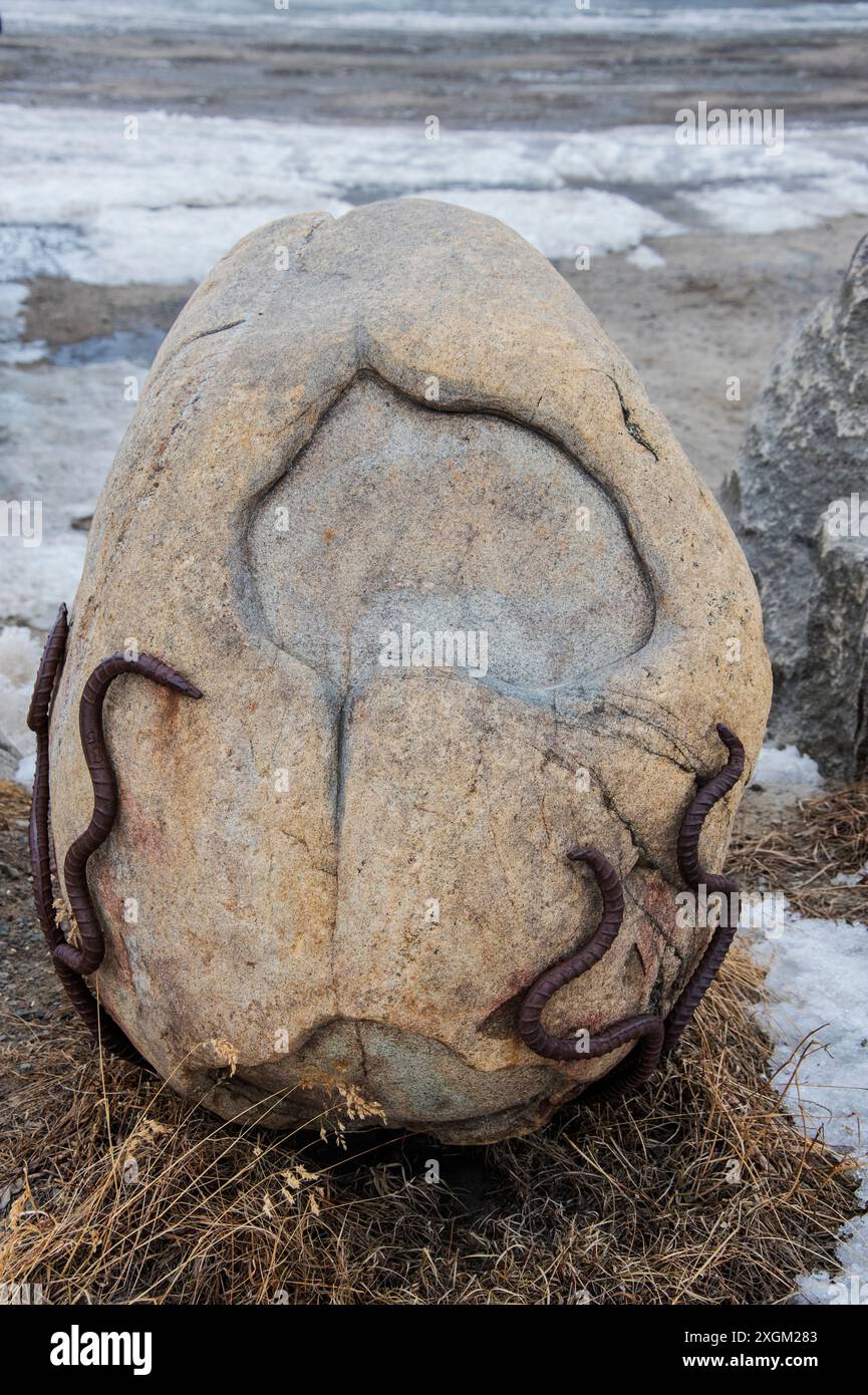 Stone carving of worms or snakes at Inuit sculpture park by the Four ...
