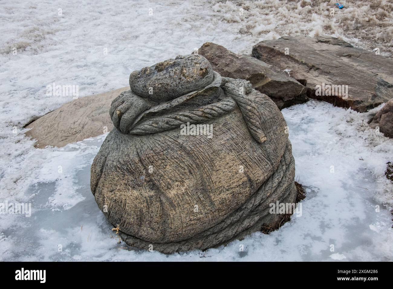 Stone carving of rope tied at Inuit sculpture park by the Four Corners ...