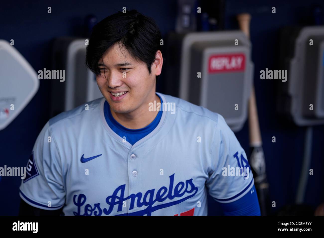 Los Angeles Dodgers' Shohei Ohtani smiles for a baseball game, Tuesday ...