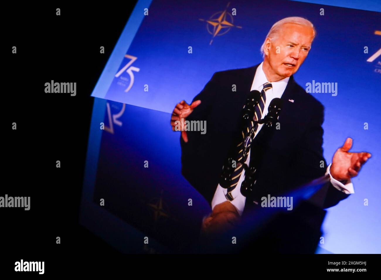 In this photo illustration, a screen shows the current US President Joe ...