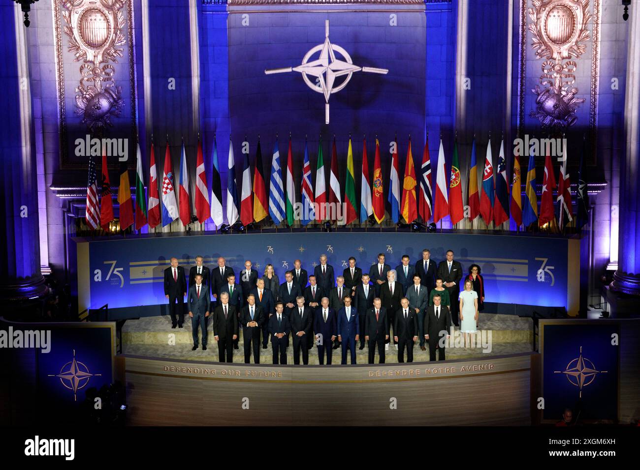 United States President Joe Biden, front row center, participates in a ...