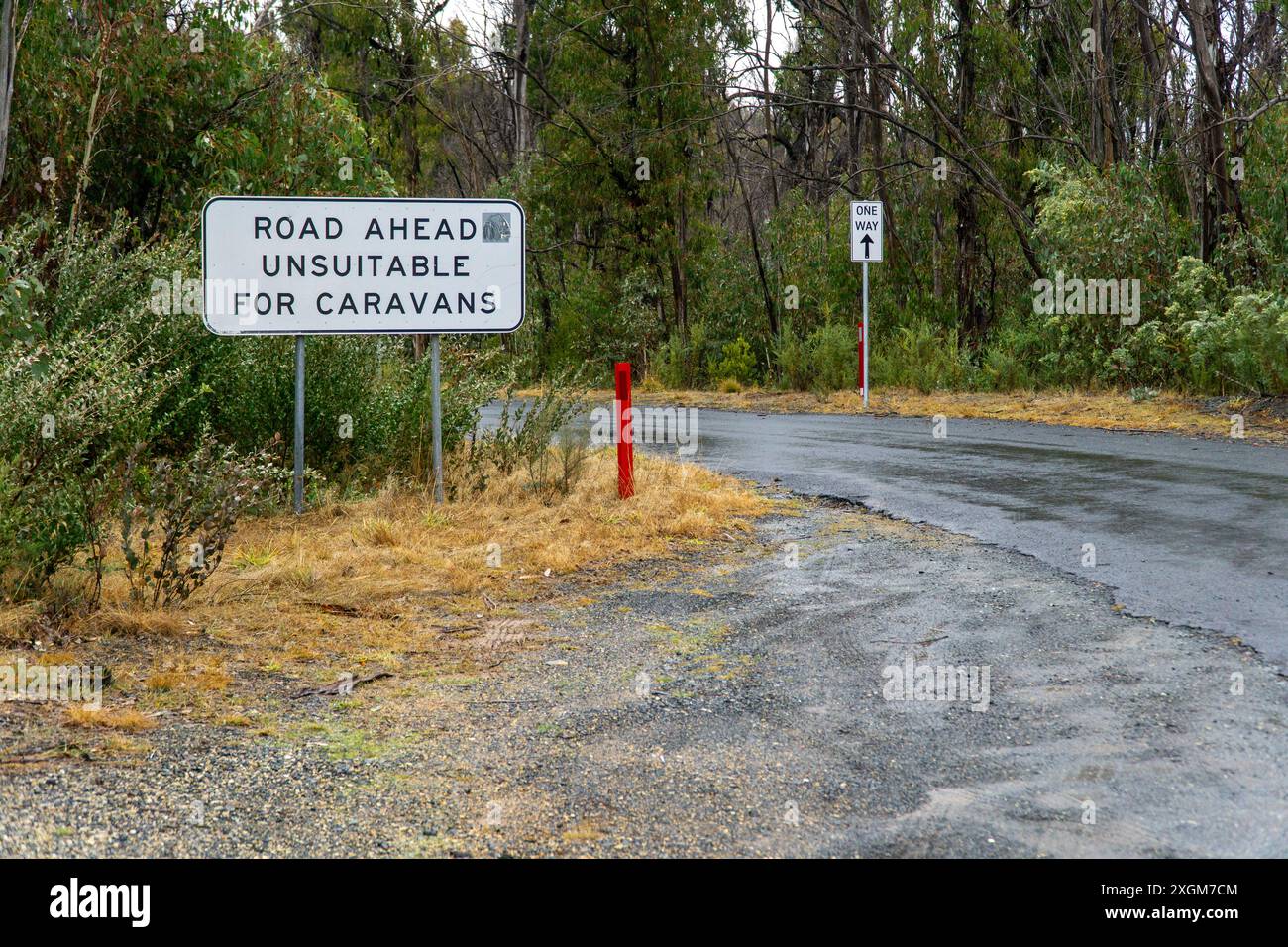 Road sign warning the road ahead is unsuitable for caravans entering ...