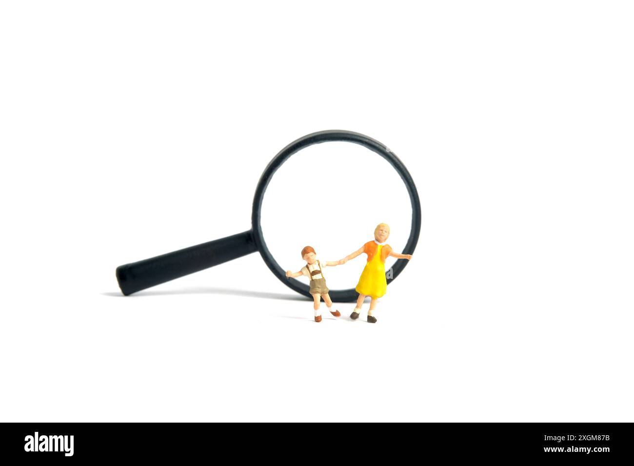 Miniature people toy figure photography. Hide and seek concept. Kids ...