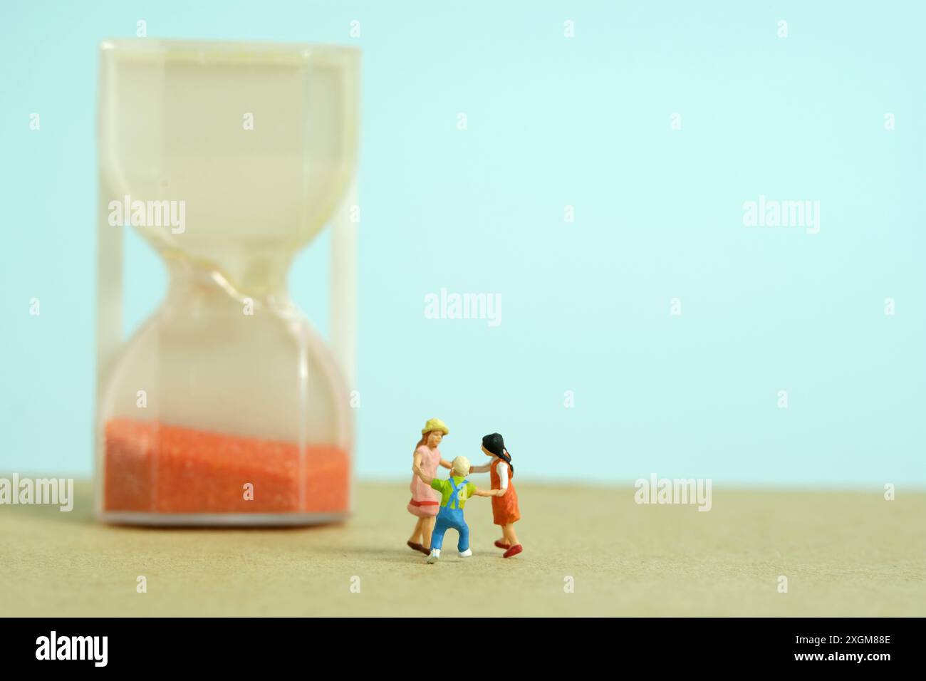 Miniature people toy figure photography. Playing time duration concept ...