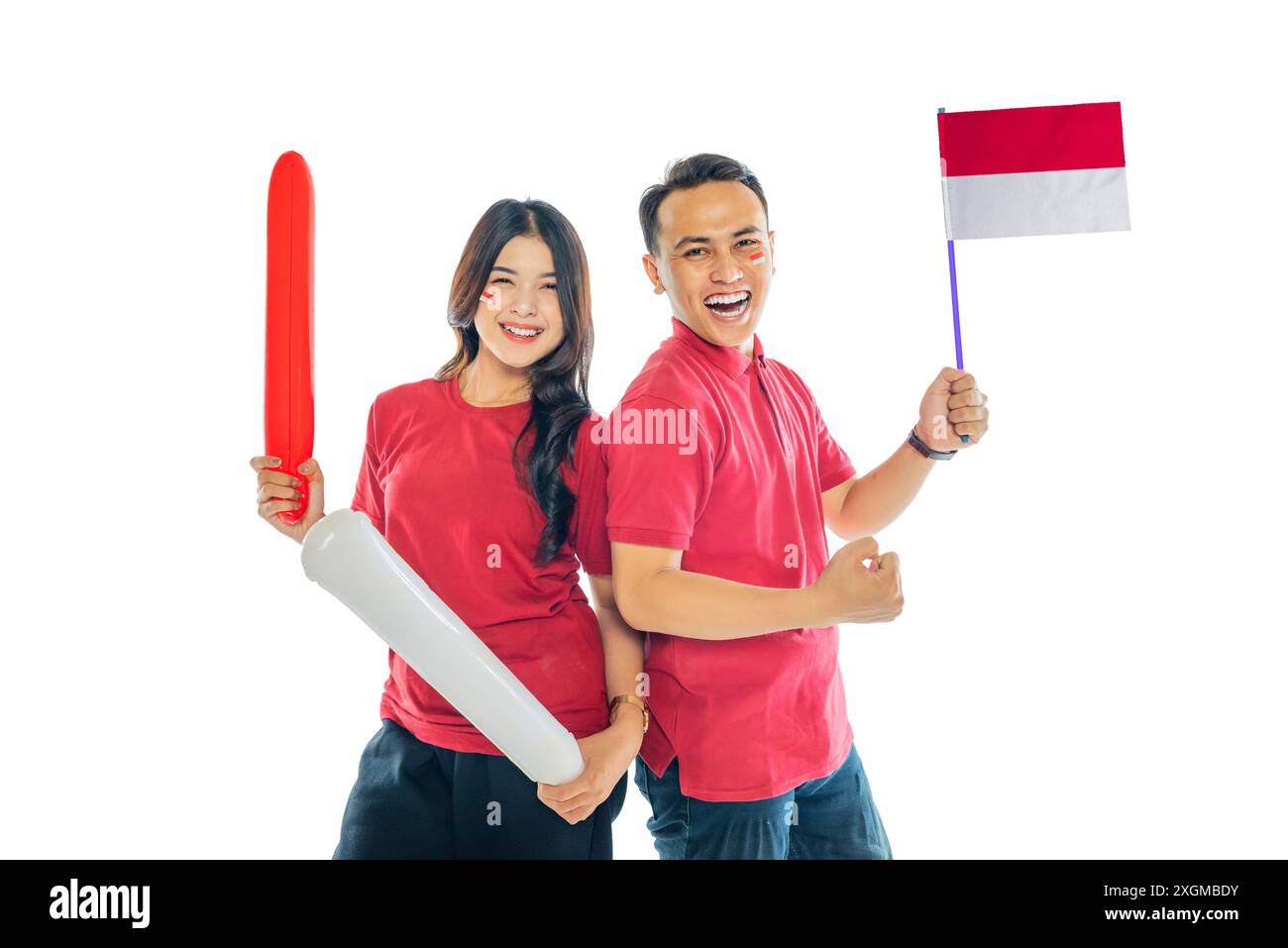 Portrait of an Indonesian couple with an excited expression supporting ...