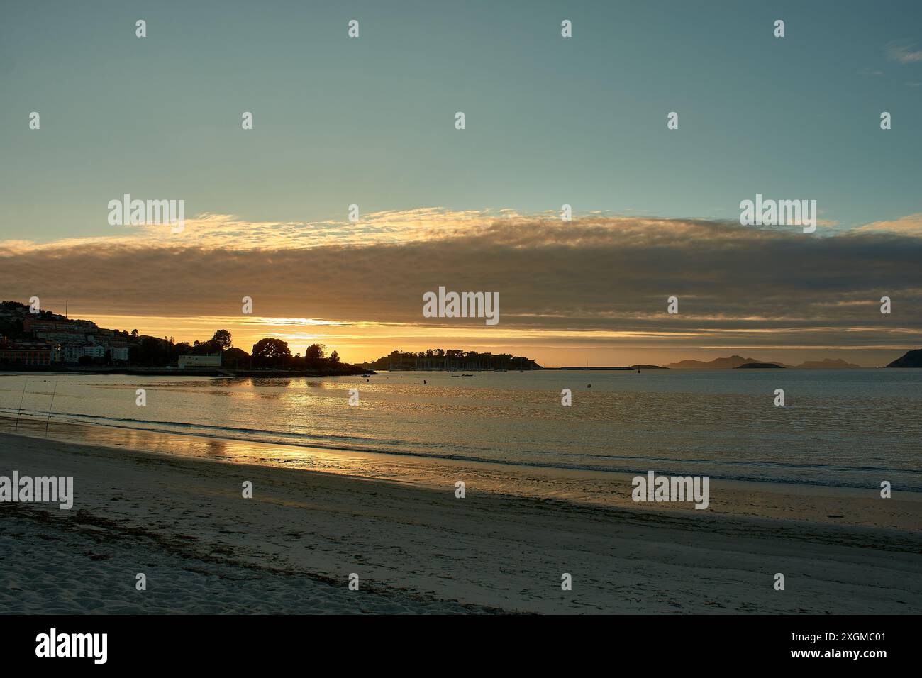 Serene beauty of a sunset at Ladeira Beach in Sabaris. Soft clouds ...
