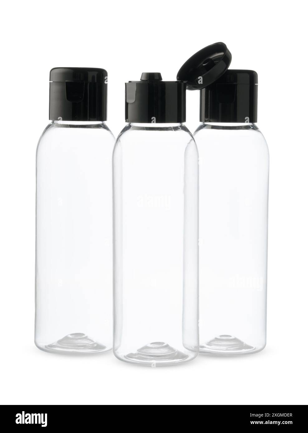 Three Clear Plastic Bottles With Black Caps on a White Background Stock ...