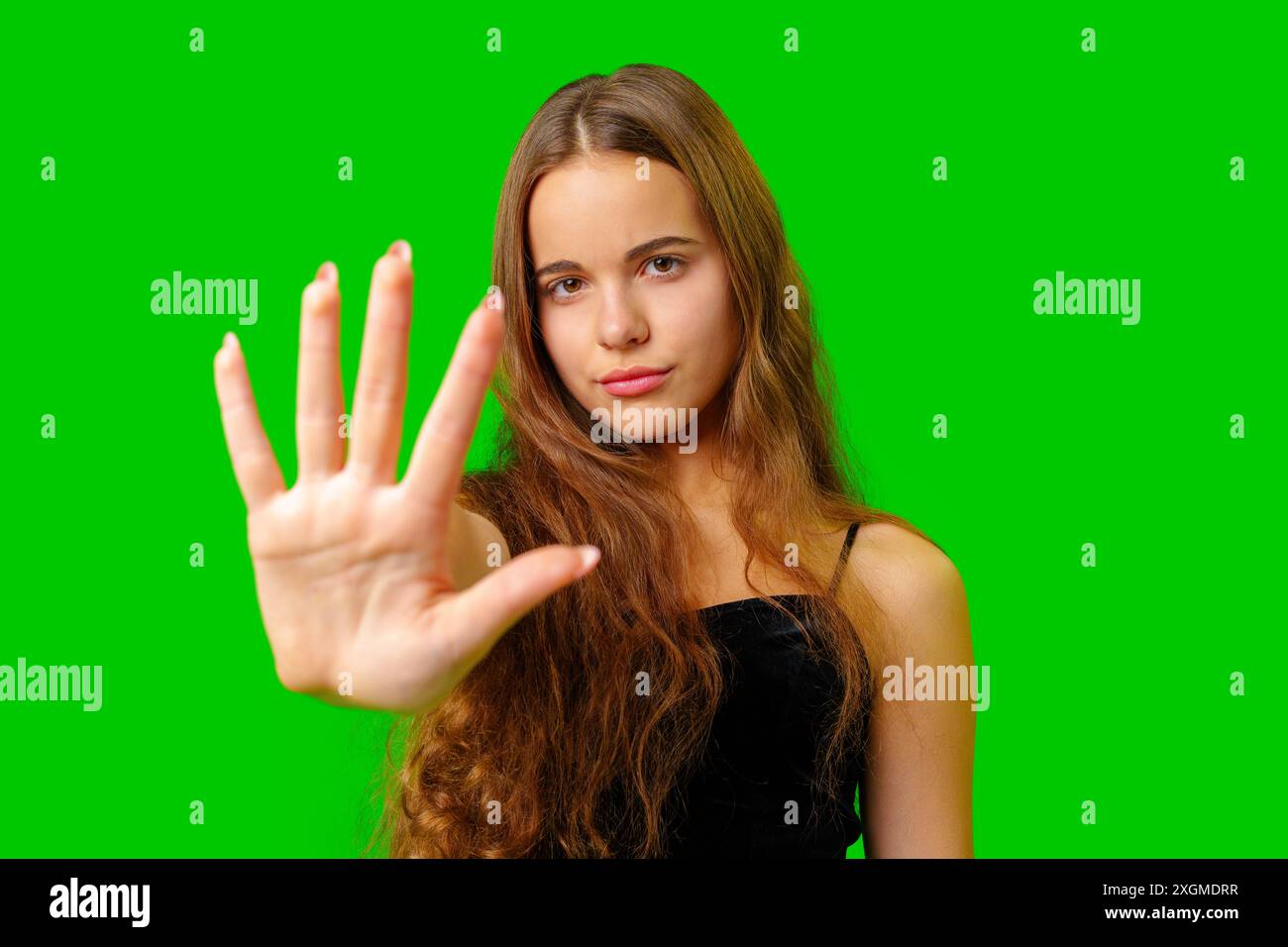 Young Woman Making a Stop Sign Gesture Stock Photo - Alamy