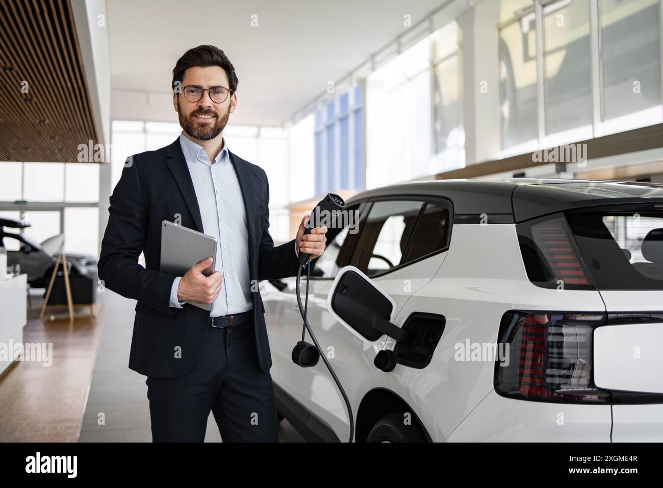 Dealer sells electric car hi-res stock photography and images - Alamy