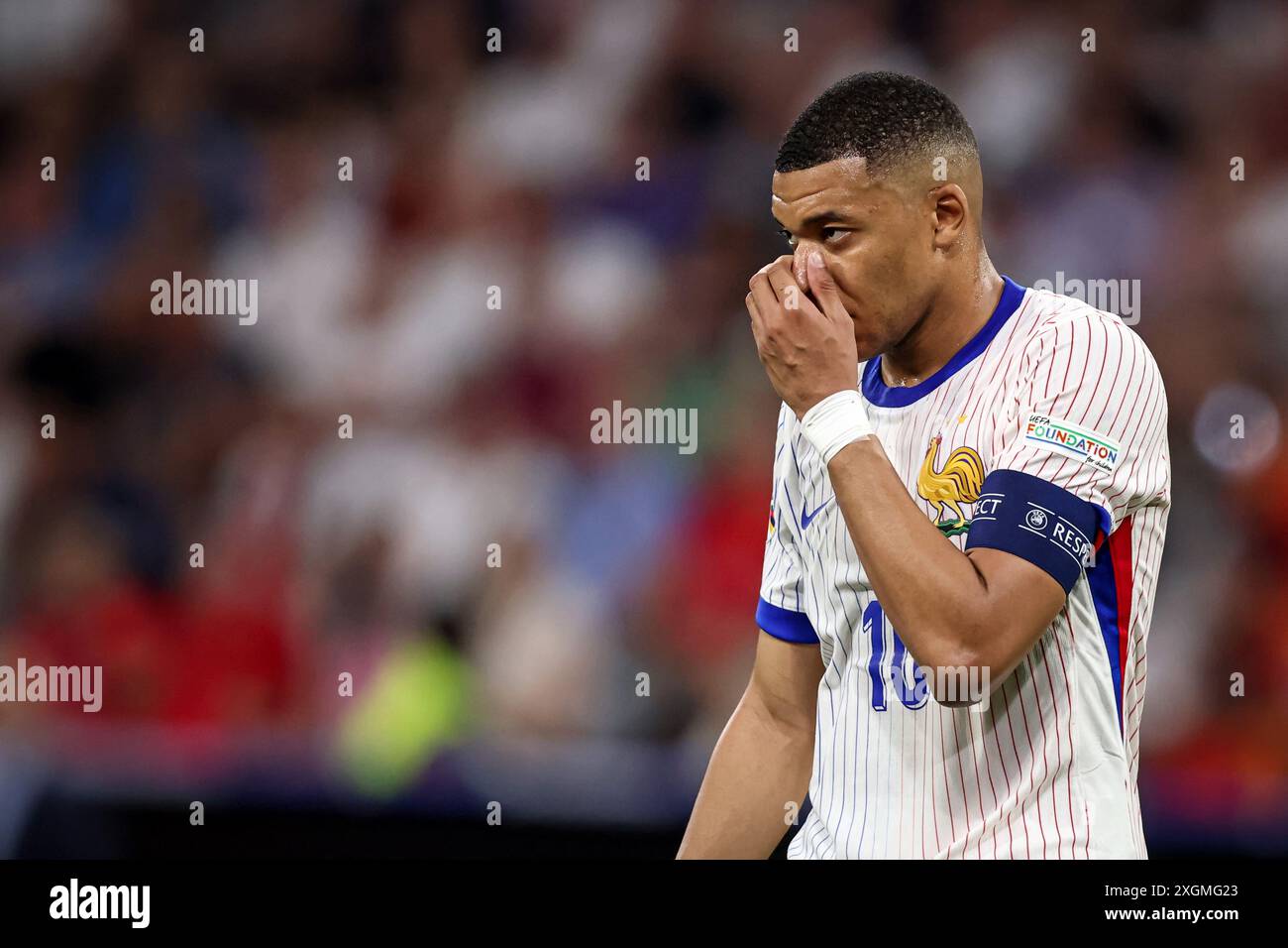 MUNICH, GERMANY - JULY 09: Kylian Mbappé of France touches his Nose ...