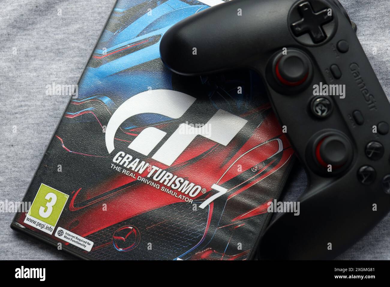 KYIV, UKRAINE - JUNE 26, 2024 Gran Turismo 7 PS5 video game disc box ...