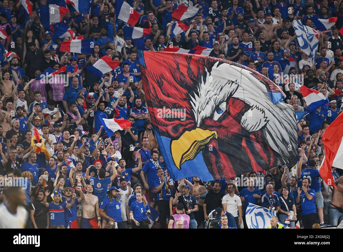 Munich, Germany. 9th July, 2024. Fans of France cheer in stands during the UEFA Euro 2024 ...
