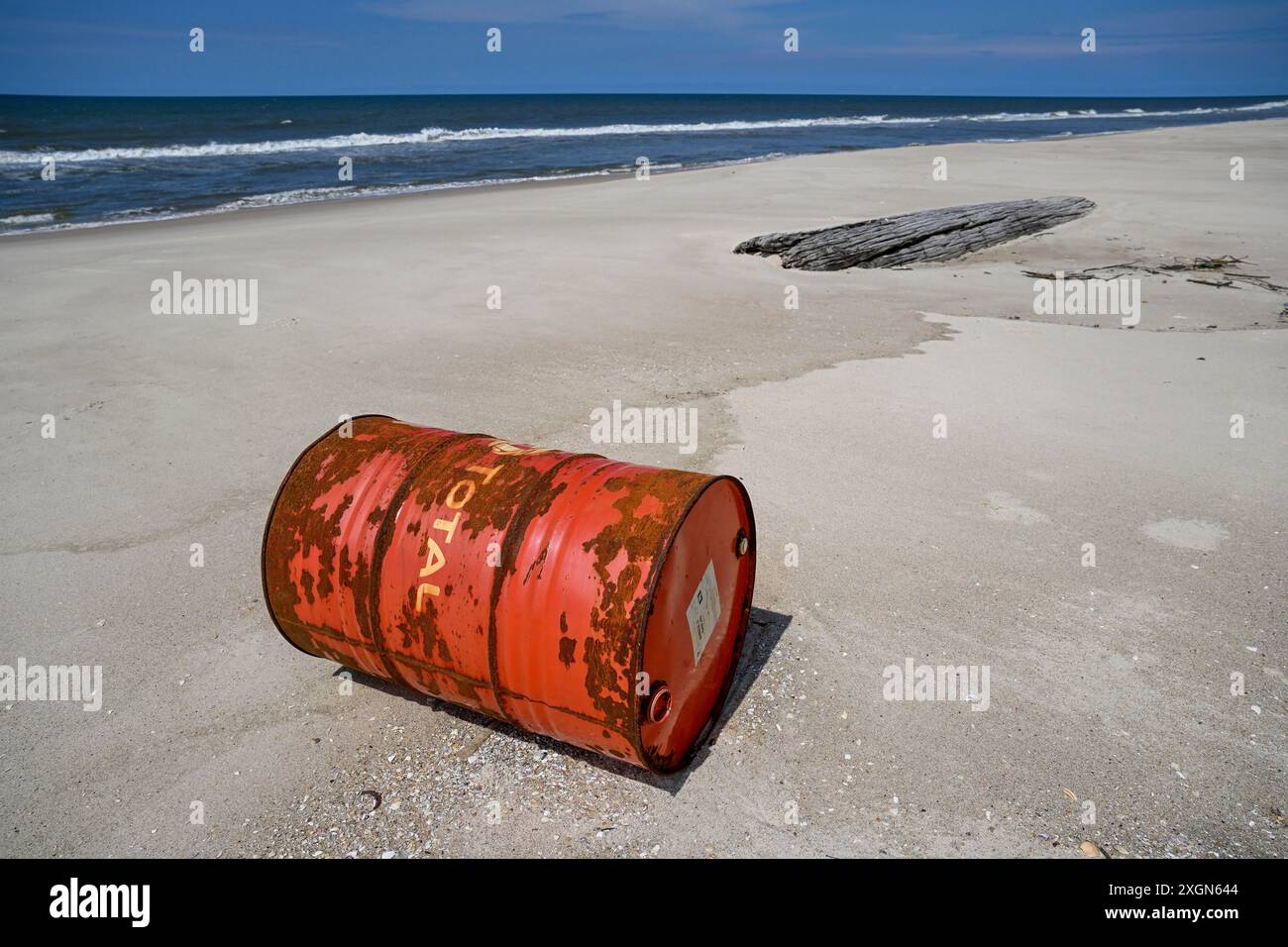 Washed up oil drum on the beach, Loango National Park, Parc National de ...
