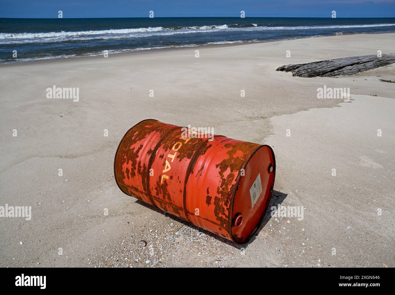 Washed up oil drum on the beach, Loango National Park, Parc National de ...