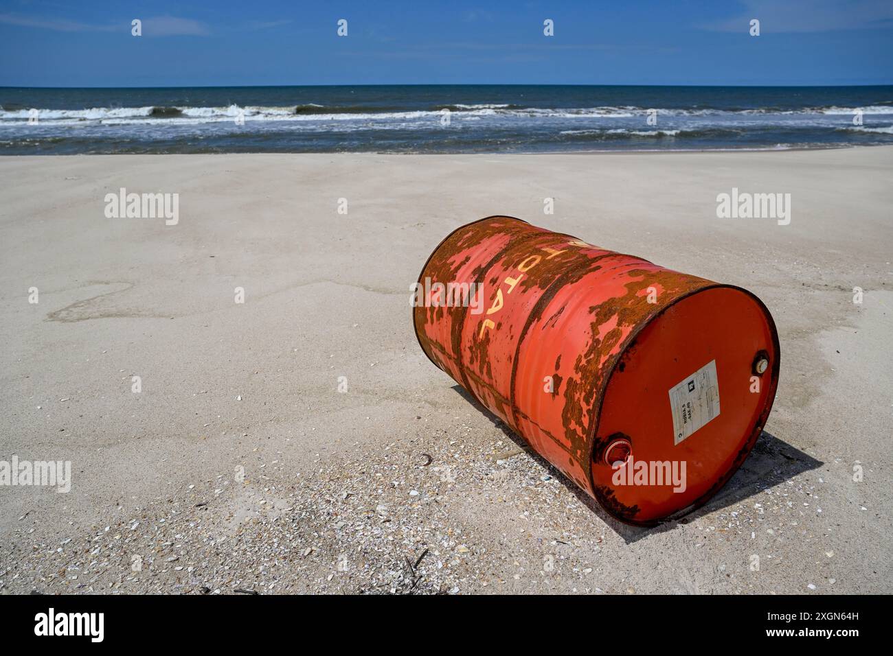 Washed up oil drum on the beach, Loango National Park, Parc National de ...