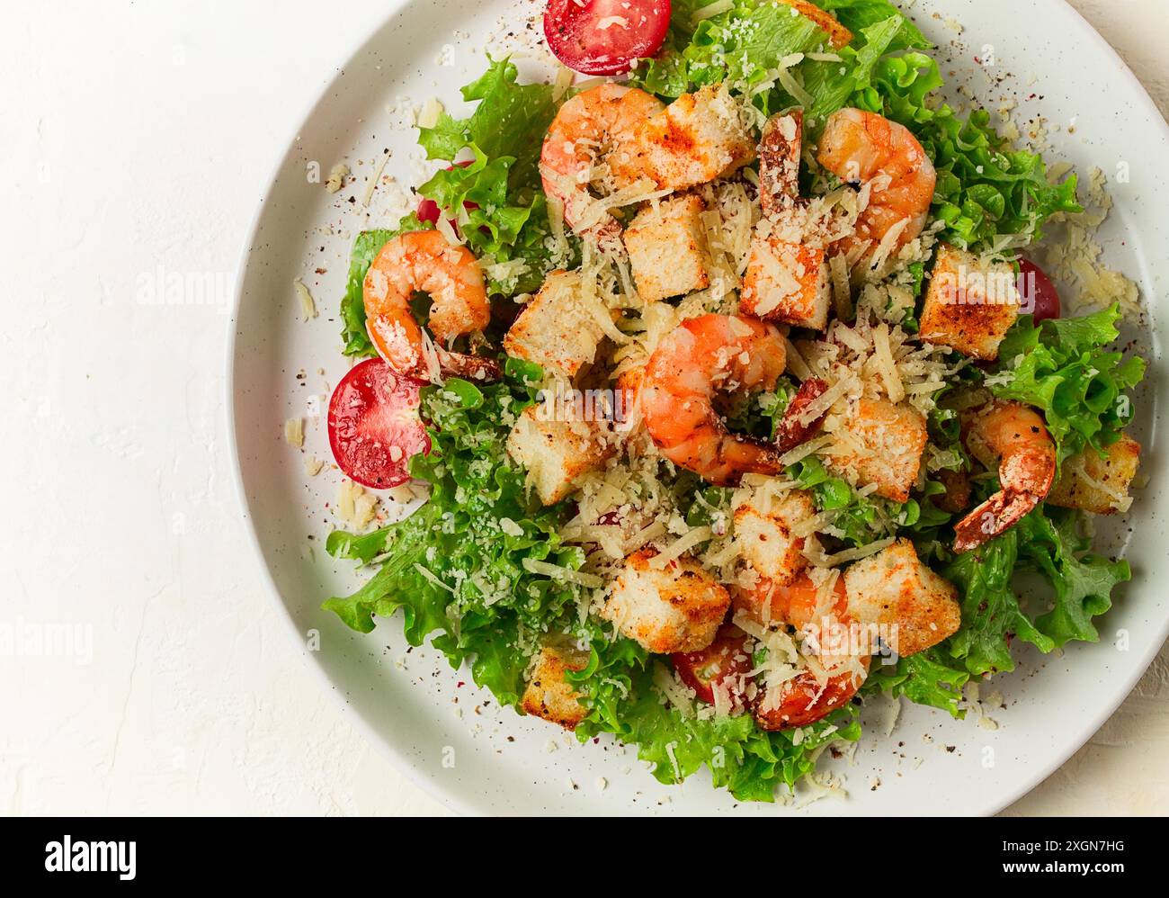 Caesar salad, with shrimp, on a white background, homemade, no people Stock Photo - Alamy