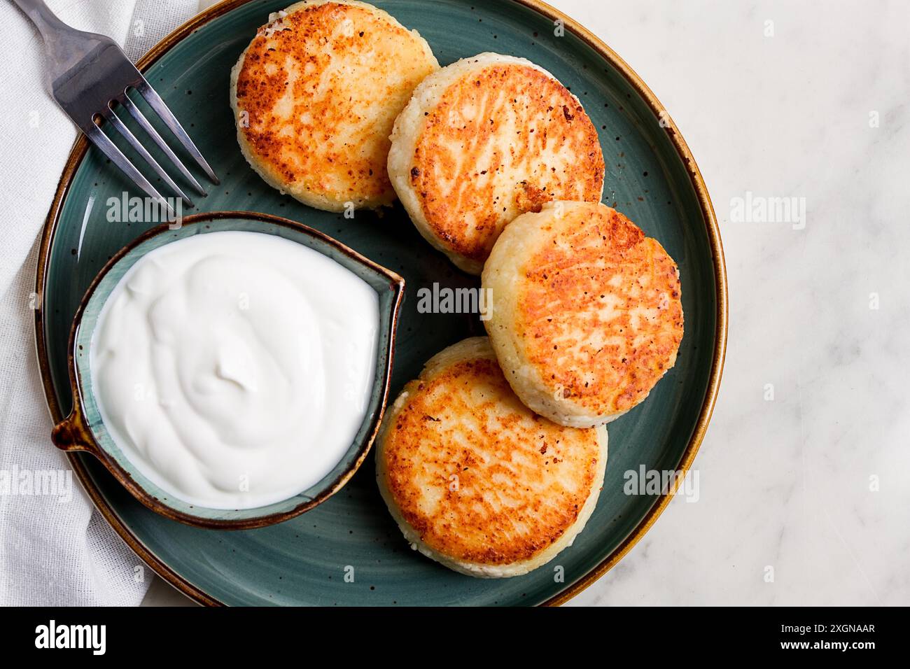 Fried, Cottage cheese pancakes, with sour cream, Cheesecakes, on a ...