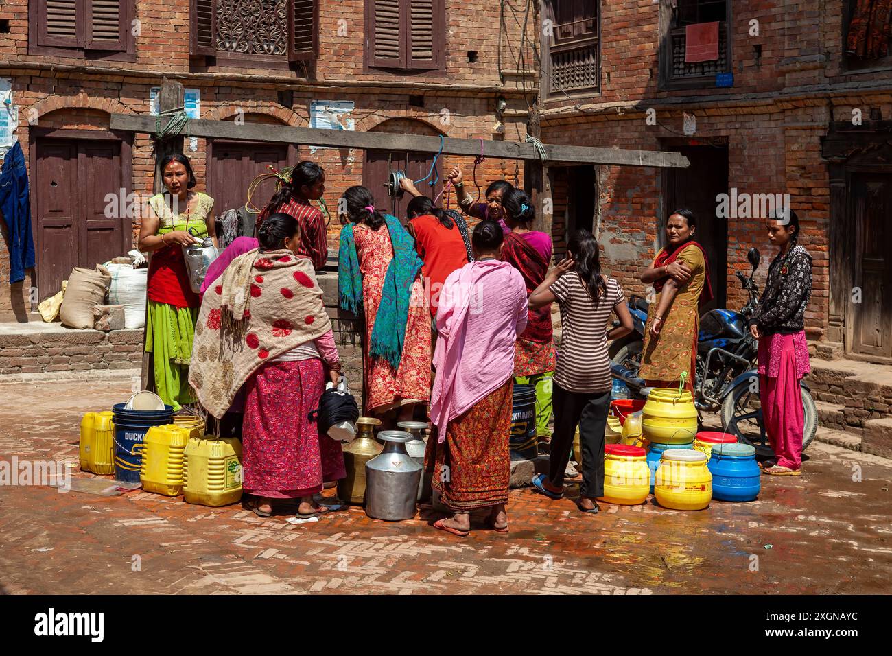 women fetch water from the well in Bhaktapur Stock Photo - Alamy
