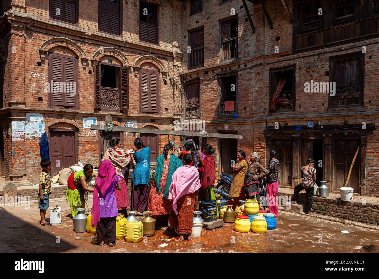 women fetch water from the well in Bhaktapur Stock Photo - Alamy