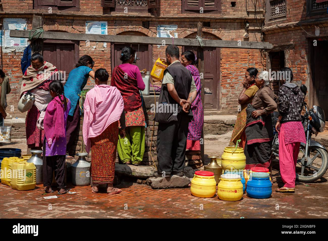women fetch water from the well in Bhaktapur Stock Photo - Alamy