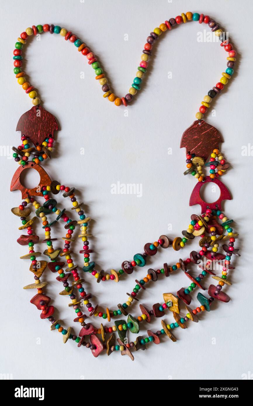 wooden effect beaded necklace with different colours and shape beads ...