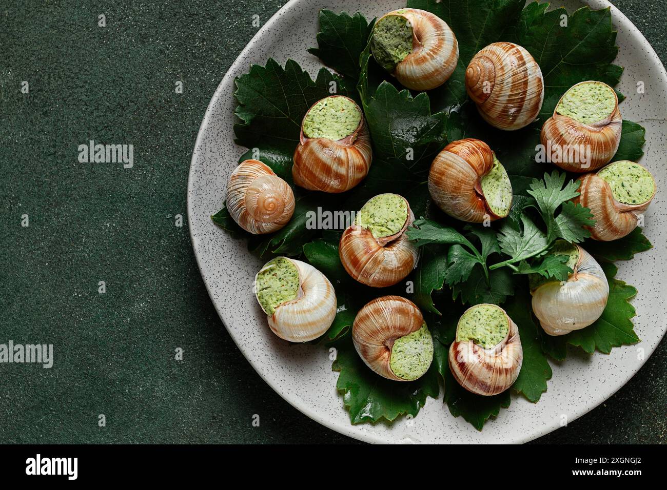 Grape snails, stuffed in burgundy, french cuisine Stock Photo - Alamy