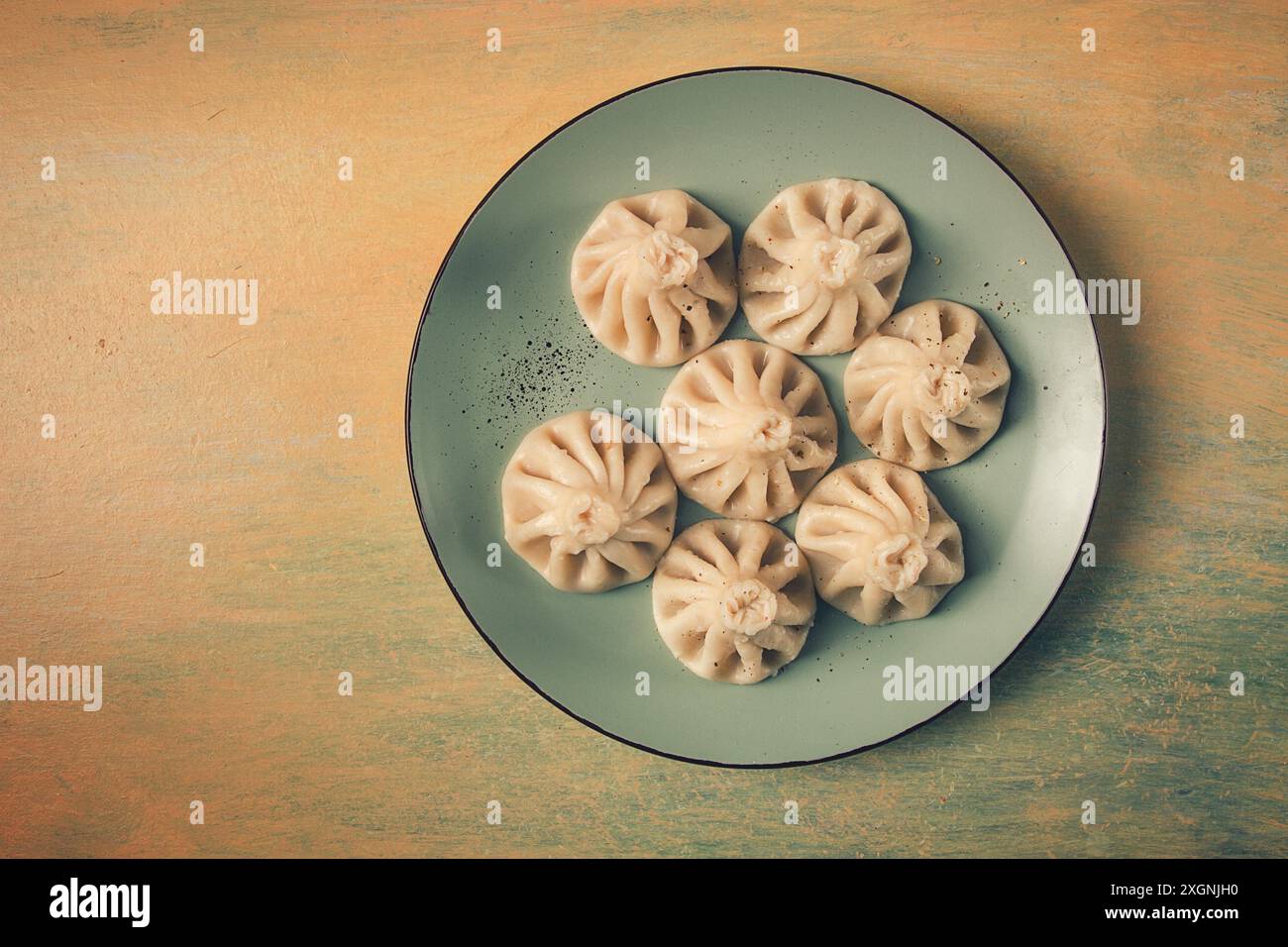 Traditional Georgian dish, Khinkali, Kalakuri, top view, rustic style ...