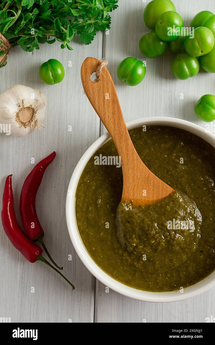 Tkemali sauce, traditional Georgian cuisine, green cherry plum, with ...