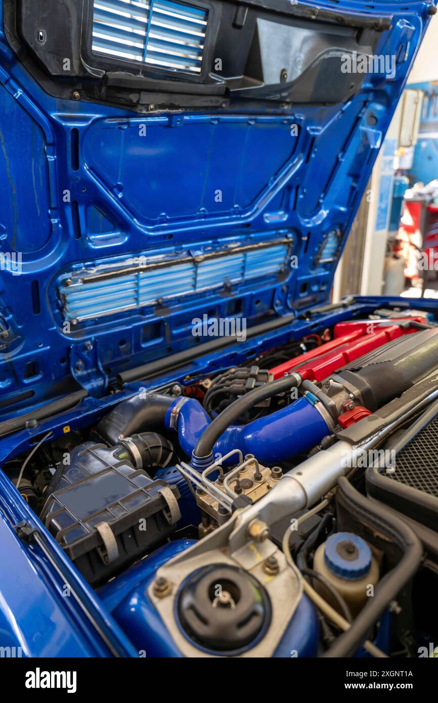 Car Engine on a Blue Car with the Hood Open in Switzerland Stock Photo ...