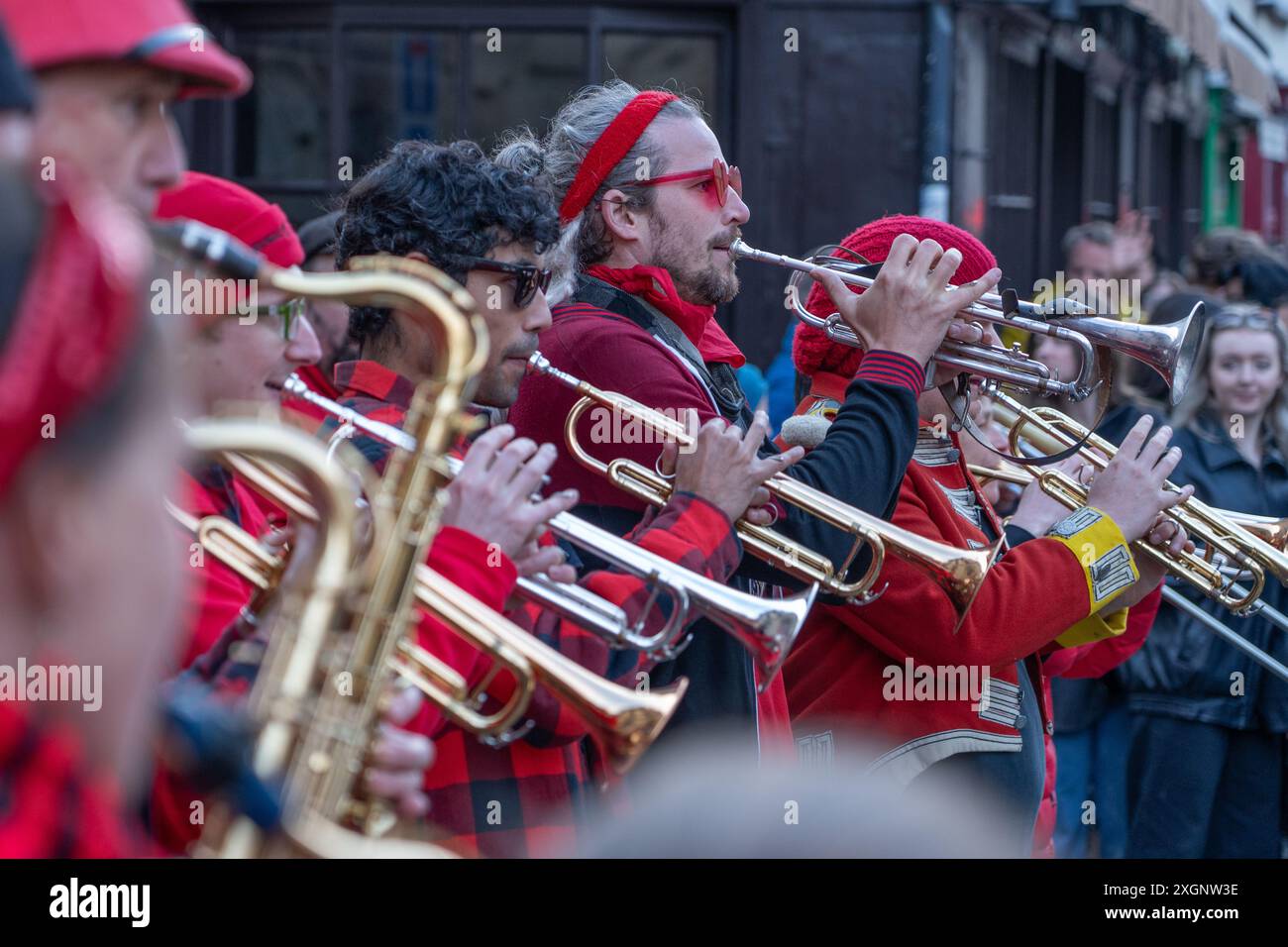 Members of the Horns of Plenty band play to a May Morning crowd ...