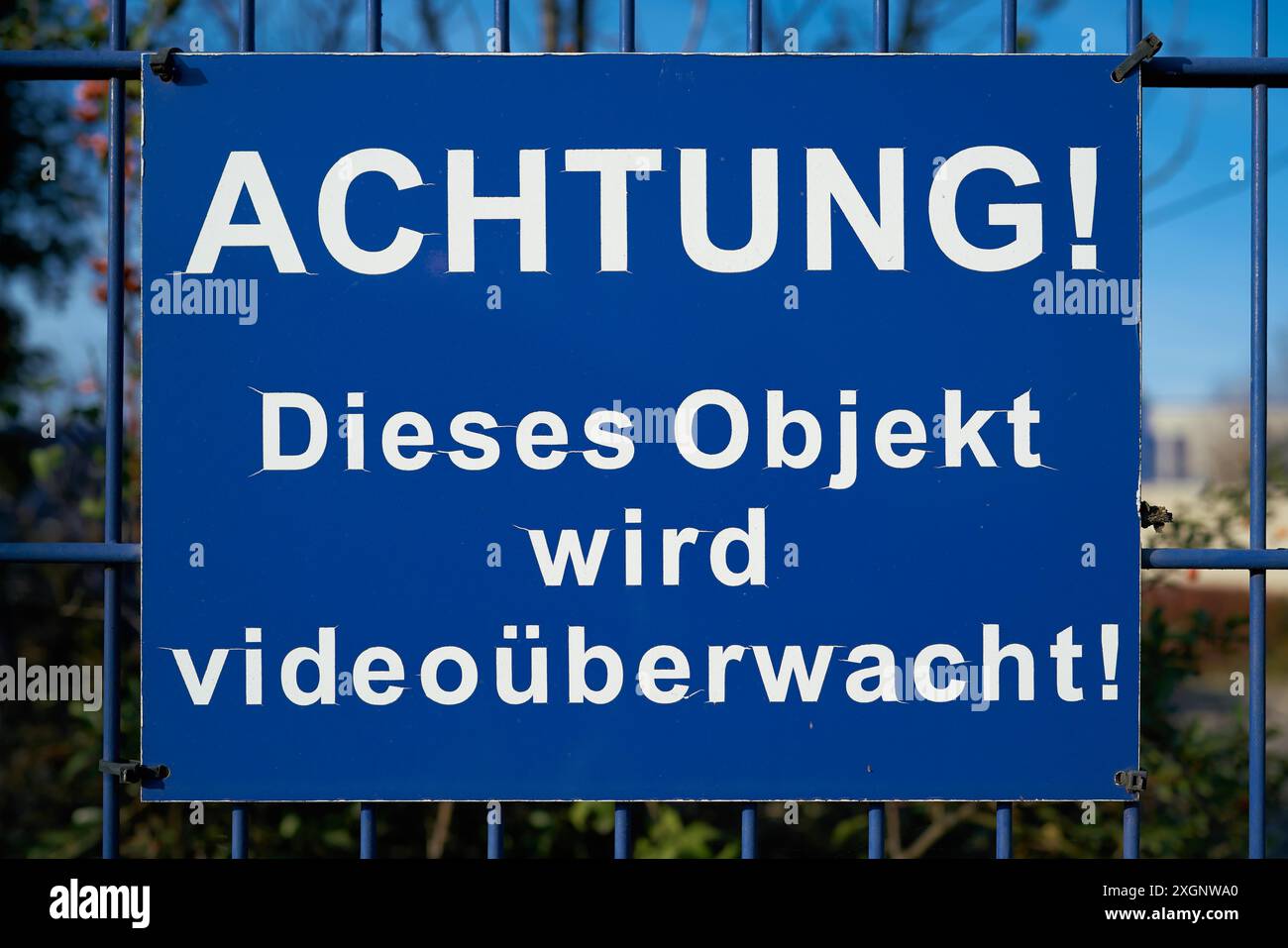 Blue sign with the inscription Stock Photo - Alamy
