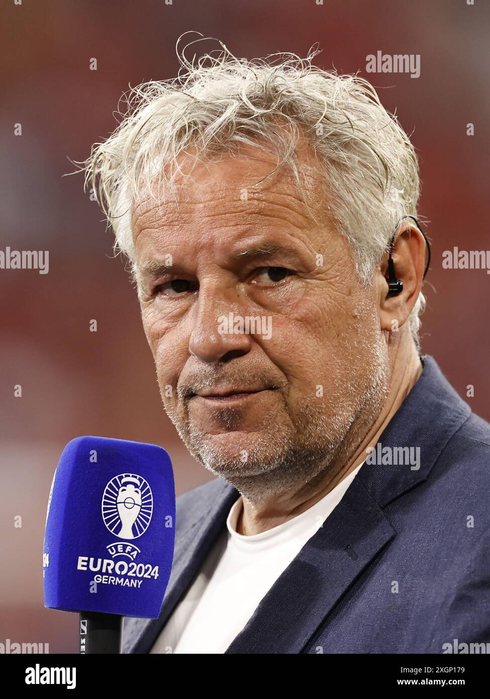 MUNICH - NOS reporter Joep Schreuder during the UEFA EURO 2024 semi ...