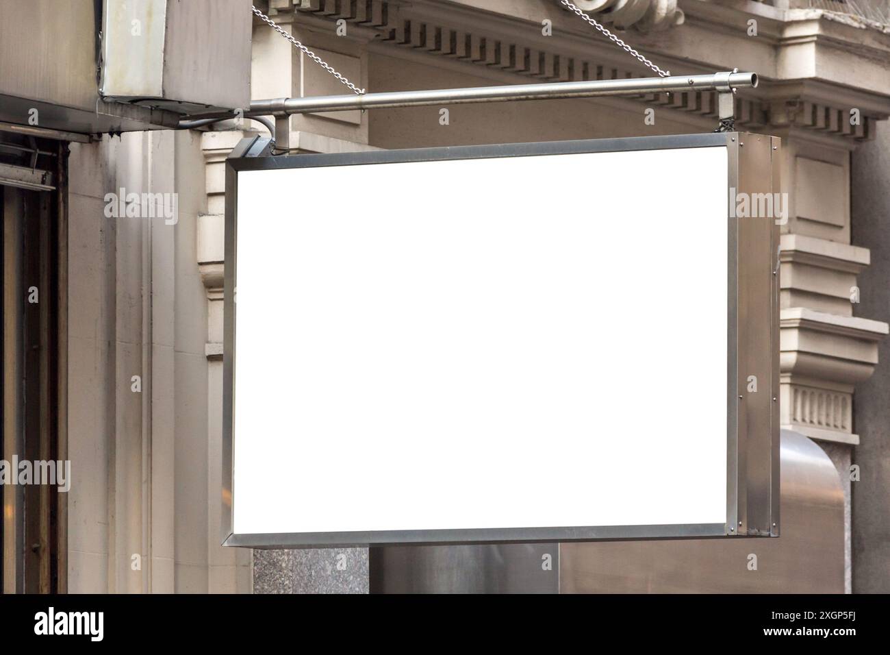 Empty signboard on a building with classical architecture. Blank store ...