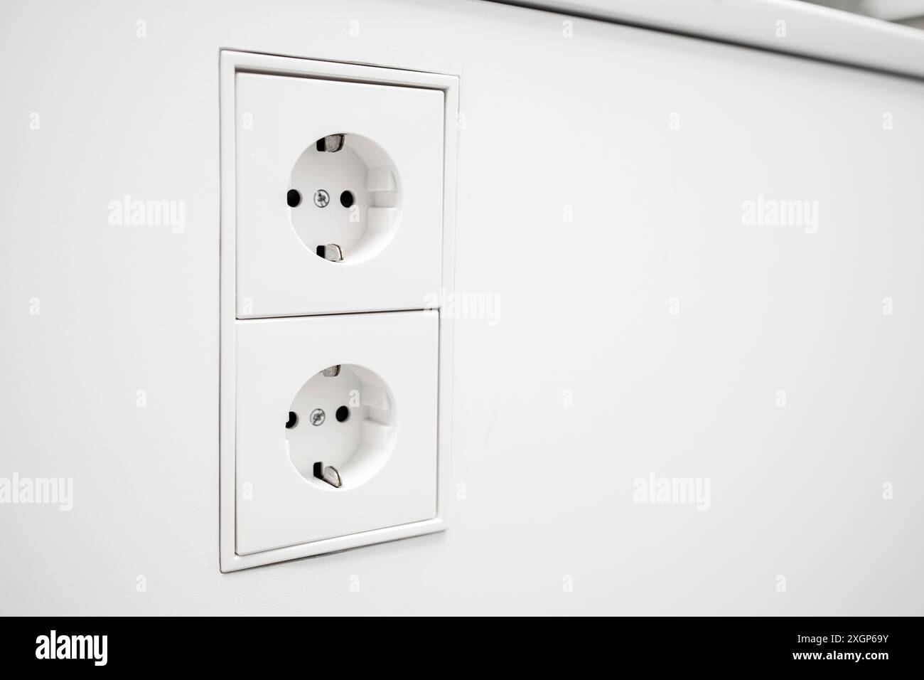 Electrical jack white plastic socket. Copy space Stock Photo - Alamy